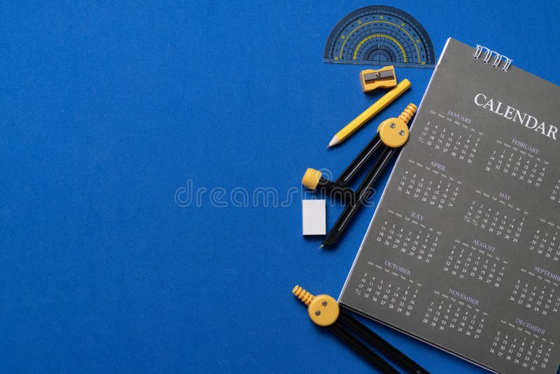Many Stationery and Calendar on Blue Table Background, Flat Lay. Space ...
