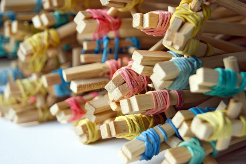 Many Student`s Chinese Sticks with Multi-colored Rubber Bands Stock ...