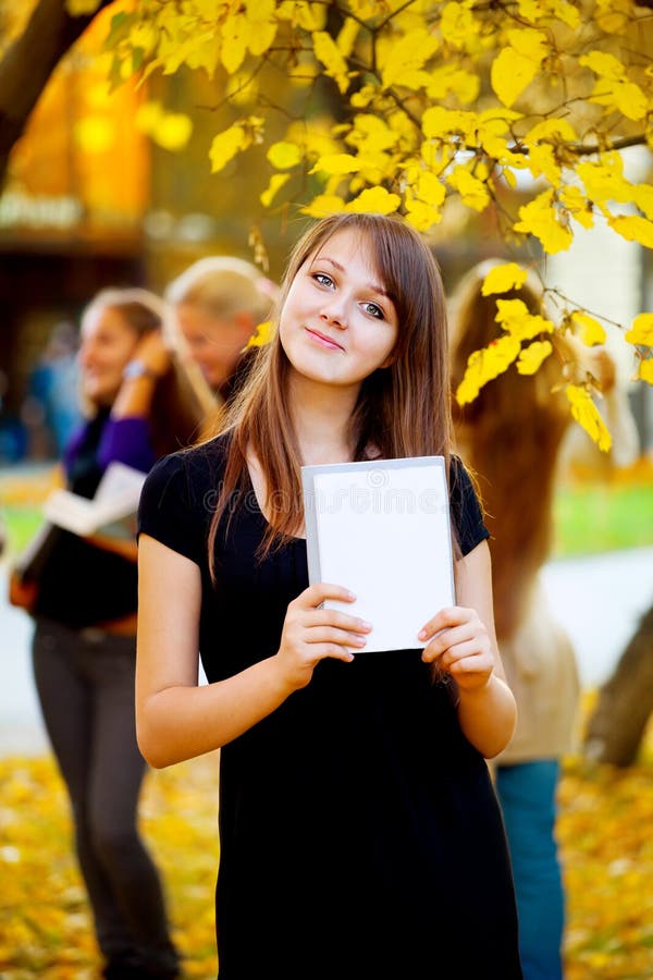 Many Students in the Autumn Park Stock Photo - Image of outdoor, jeans ...