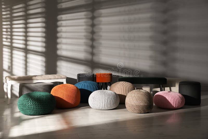 Many Stylish Different Poufs and Benches in Room. Home Design Stock ...