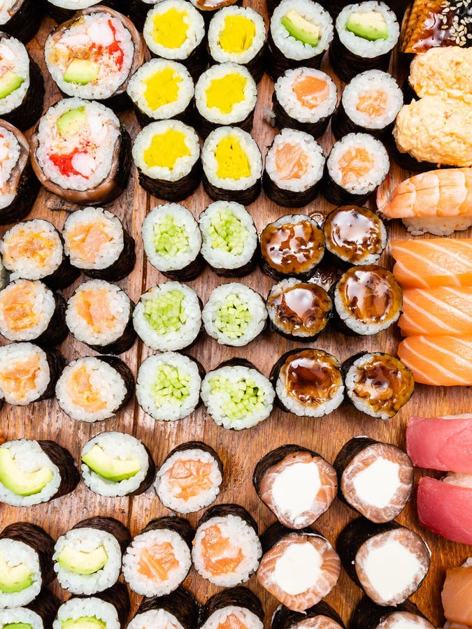 Many Sushi and Rolls on Wooden Table Stock Image - Image of american ...