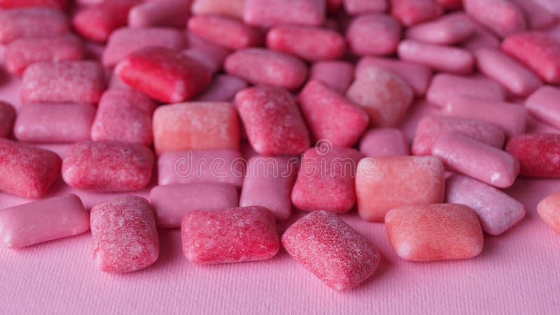Many Sweet Chewing Gums on Pink Background, Closeup Stock Photo - Image ...