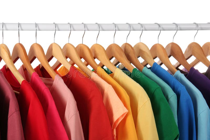 Many T-shirts Hanging in Order of Rainbow Colors Stock Photo - Image of ...