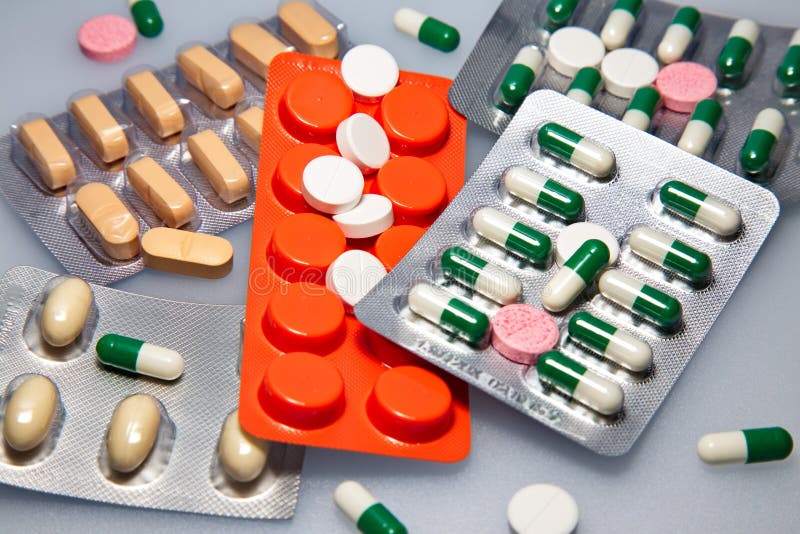 Many tablets and capsules. stock photo. Image of epidemic - 66964454