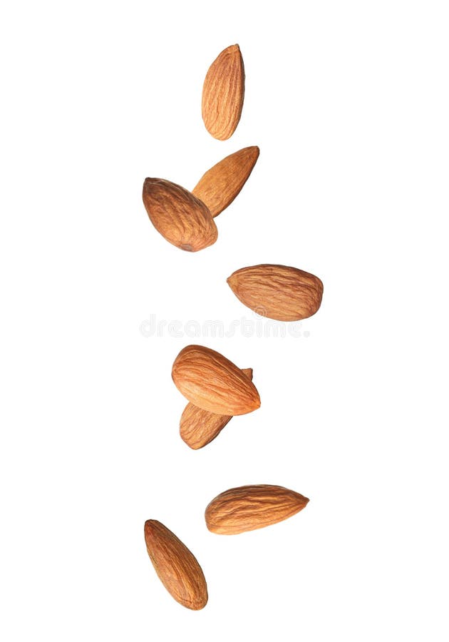 Many Tasty Almonds Falling on White Background Stock Photo - Image of ...
