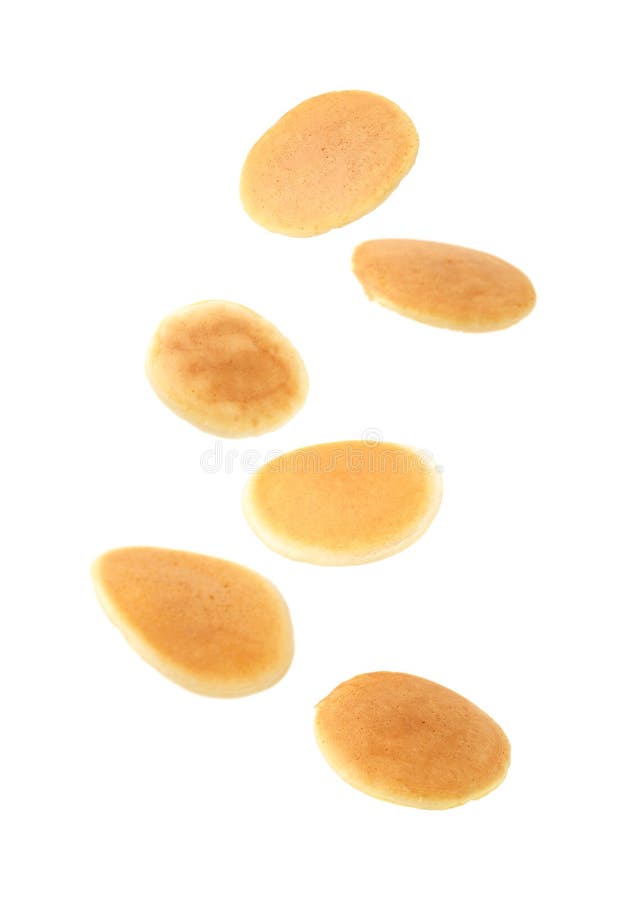 Many Tasty Fresh Pancakes Falling on White Background Stock Image ...