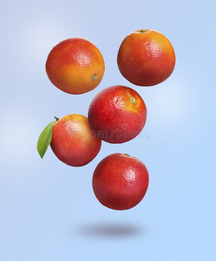 Oranges Falling with a Splash of Orange Juice. Stock Image - Image of ...