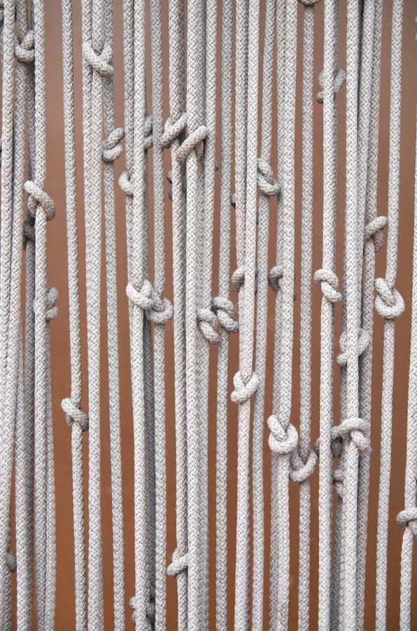 Many Thick White Hanging Ropes with Knots Closeup Stock Image - Image ...