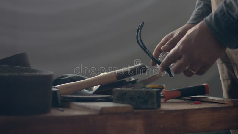 Many Tools on the Worker Table and His Hand Choosing One of Tool Stock ...