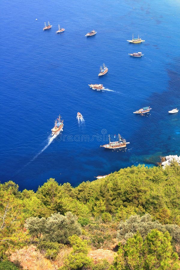 Many touring boats stock photo. Image of beach, rock - 15922370