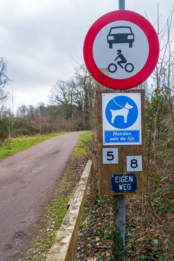 Traffic Signs on Forest Path Stock Image - Image of forbidden, leash ...