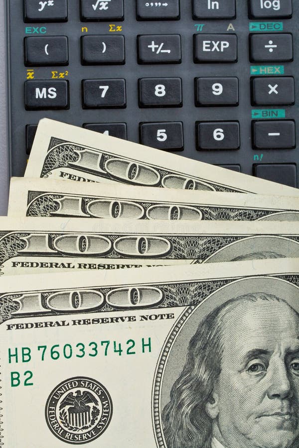 Many Us Dollars Over Calculator Stock Photo - Image of number ...