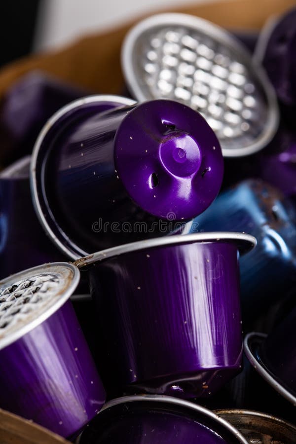 Many Used Coffee Aluminium Capsules on a Trash Bin Stock Photo - Image ...