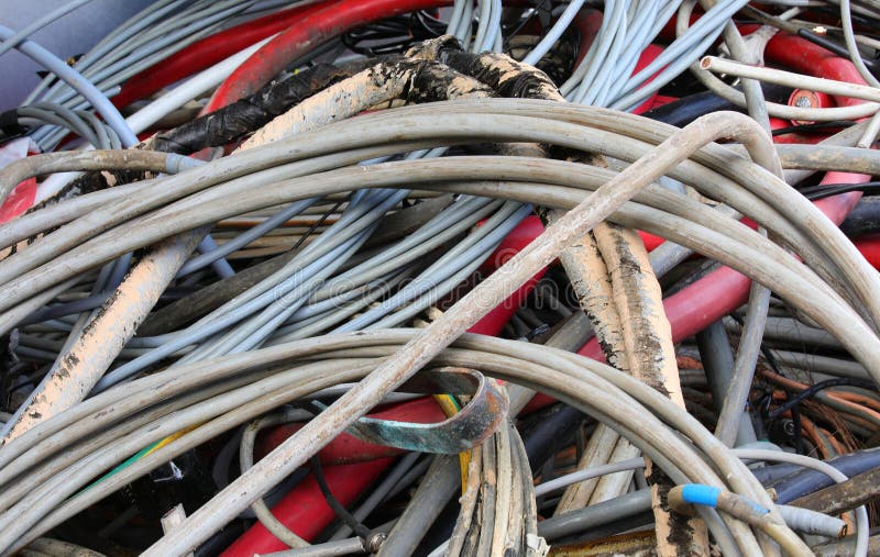 Many Used Old Electrical Cords in a Recycling Container for Copper ...
