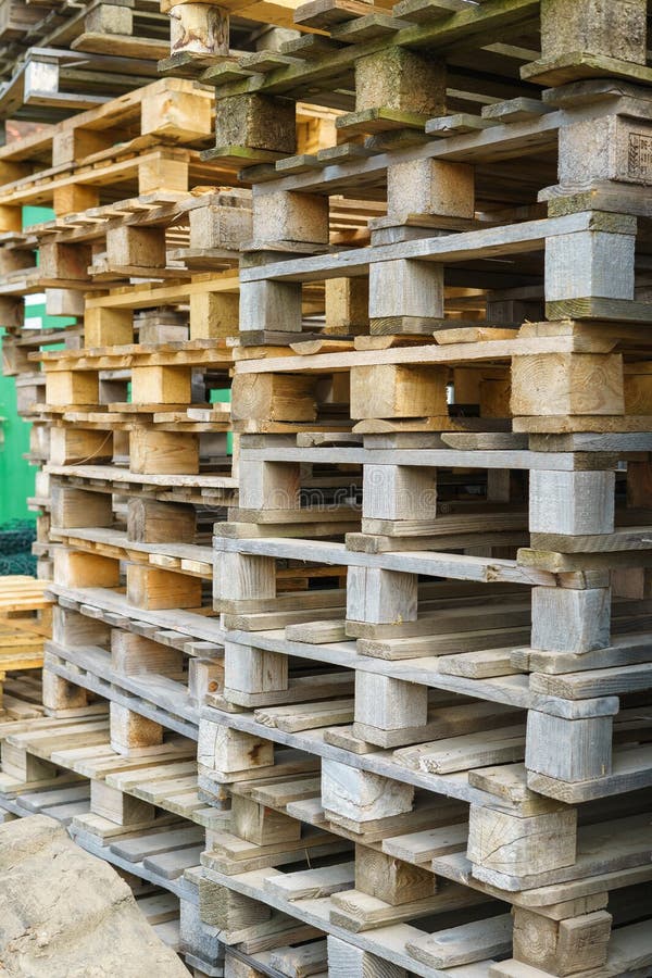Many Used Wooden Pallet Stacks on a Construction Site. Warehouse ...