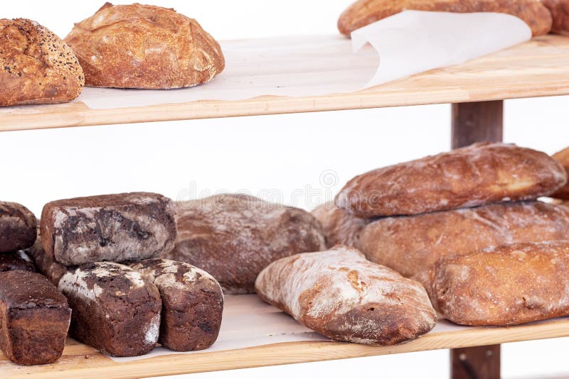 Many Varieties of Bread of Different Colors on the Shelves Stock Image ...