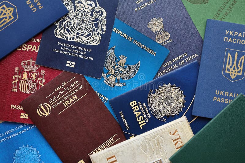 Many Various Passports Of Citizens Of Different Countries And Regions