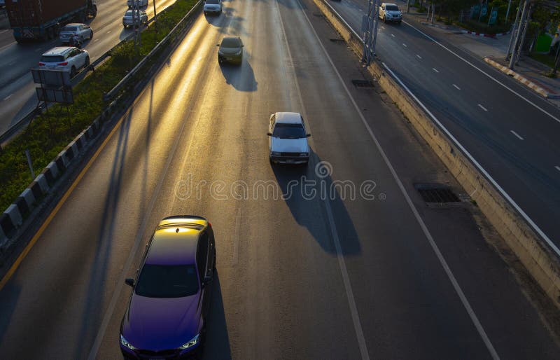 Many Vehicles are Driving on the Road Stock Photo - Image of blurred ...