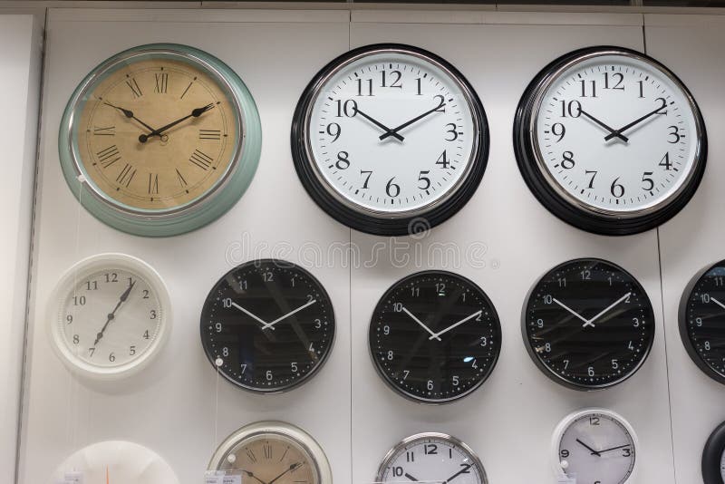 Many Wall Clock on the Wall Stock Image - Image of group, collection ...