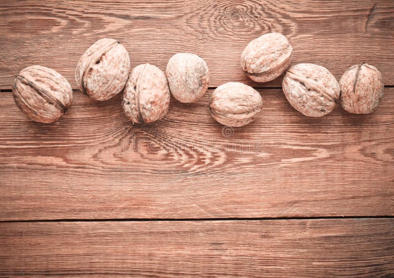 Many Walnuts in a Shell on a Wooden Table. Copy Space Stock Photo ...