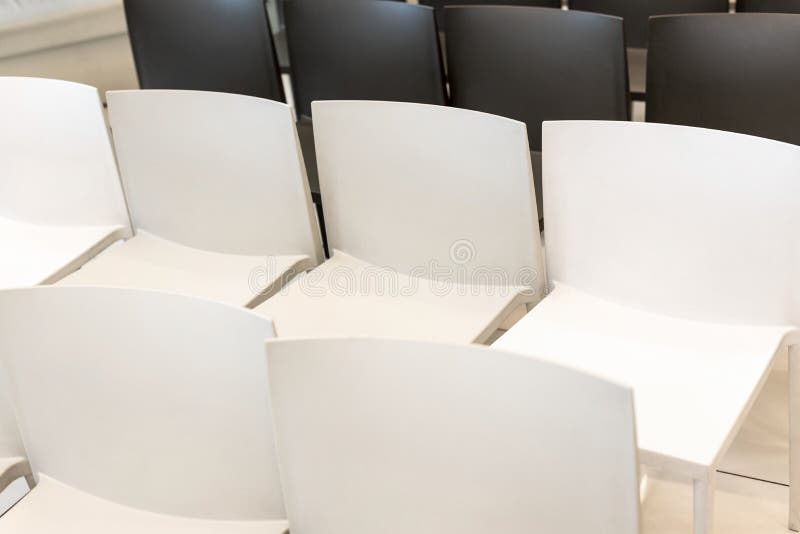 Many White and Black Chairs Stand in Several Rows Stock Photo - Image ...