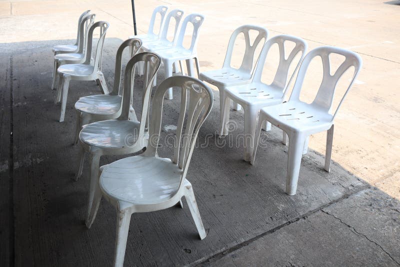 Many White Plastic Chairs are Arranged Together. Stock Photo - Image of ...