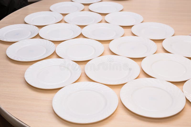 Many White Plates on a Table, Pattern of Dishes Stock Image - Image of ...