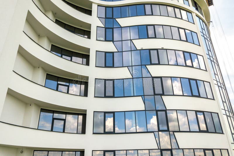 Many Windows on New Apartment Building Facade Stock Image - Image of ...