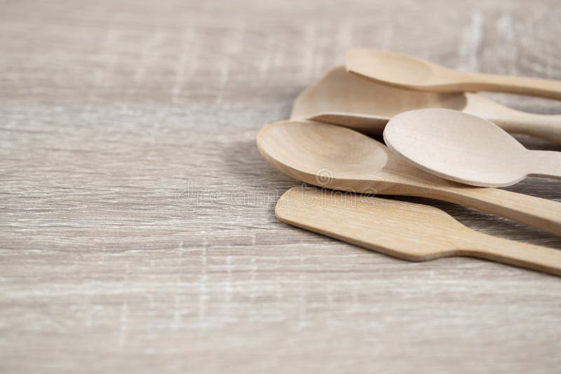 Many wood spoons on table stock image. Image of spoon - 117042389