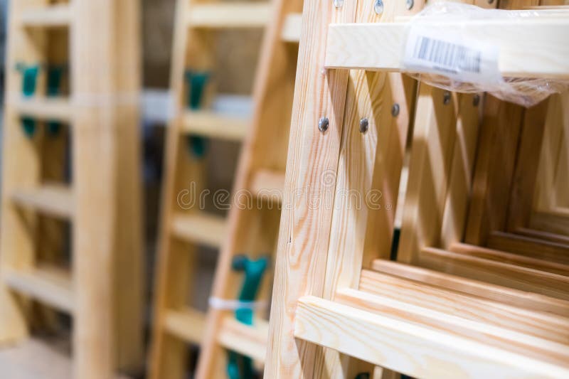 Many Wooden Ladders. Stack of Wooden Stairs in a Store. Stock Image ...