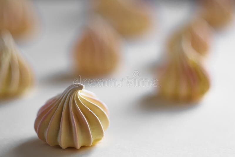 Many Yellow Meringue, on White Background. Stock Photo - Image of ...