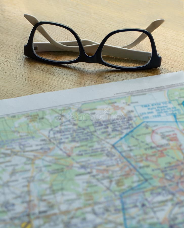 The Map Of The Area Is Blurred And Near Glasses For Poor Vision With ...