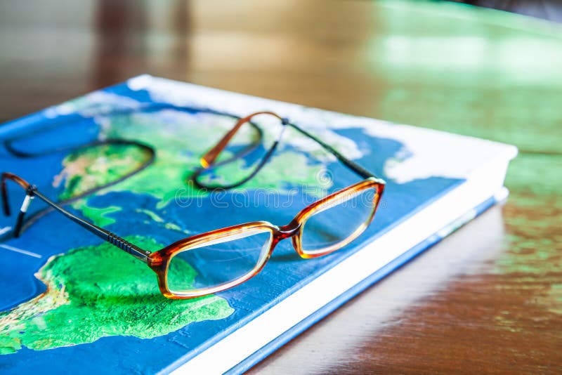 Map book and glasses stock photo. Image of reading, writing - 63042264