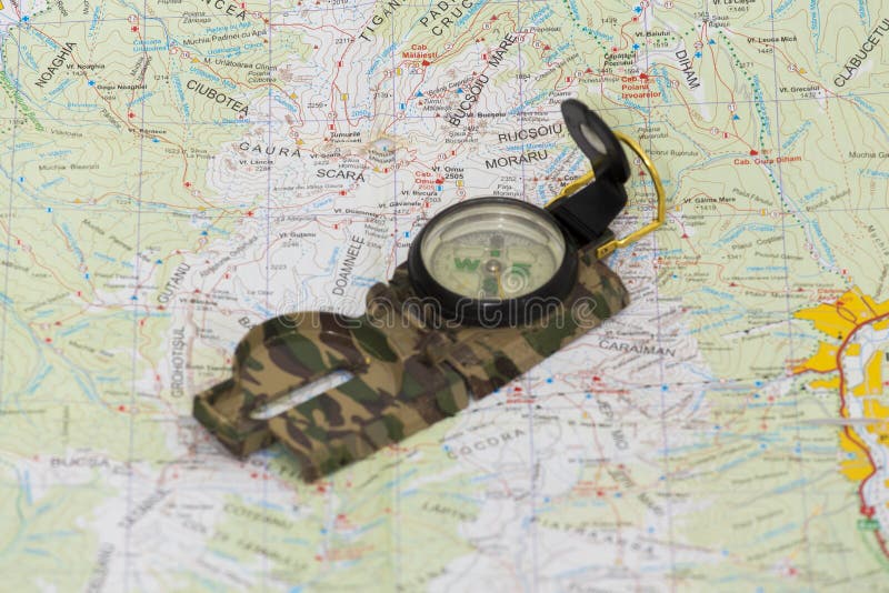 Military Compass on a Mountain Map Stock Photo - Image of south, plan ...
