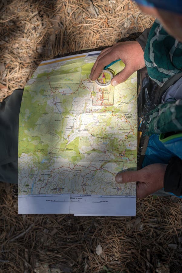 Map and compass in sunspot stock image. Image of hike - 70883021