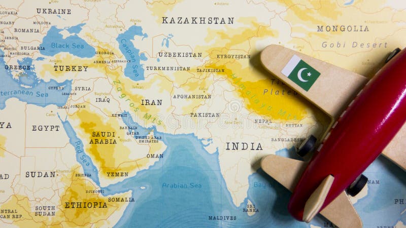 A Map of Pakistan and a Red Plane with a Flag of Pakistan Attached To ...