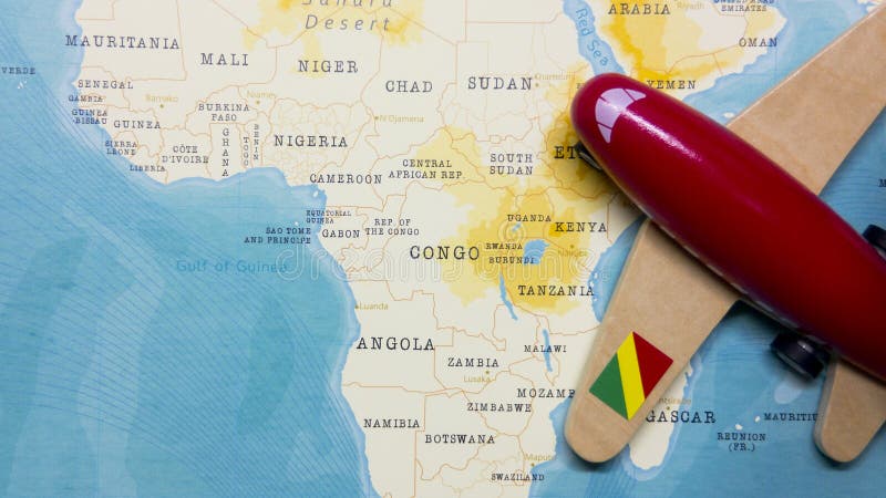 A Map of Congo and a Red Plane with a Flag of Congo Attached To Its ...