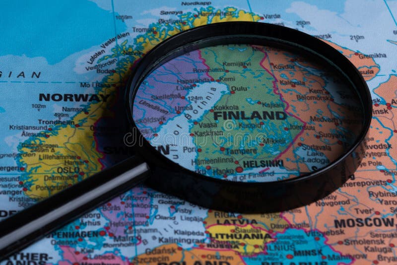 Map of Finland through Magnifying Glass.Close-up. Stock Photo - Image ...