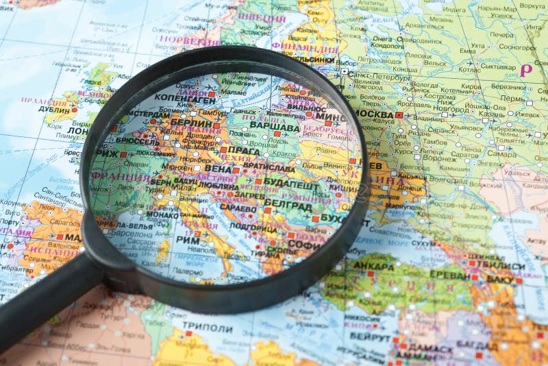 Map and magnifying glass. stock photo. Image of blue - 115579580