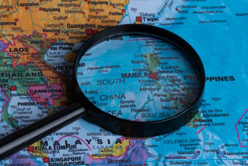 Map of Manila through Magnifying Glass.Close-up. Stock Photo - Image of ...