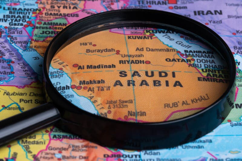 Map of Saudi Arabia through Magnifying Glass.Close-up. Stock Photo ...