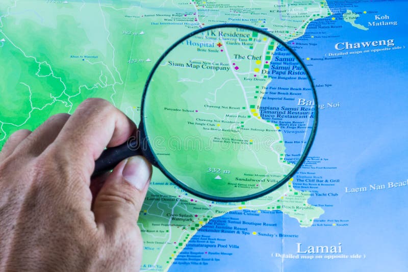 Map searching stock image. Image of hand, front, magnify - 32564331