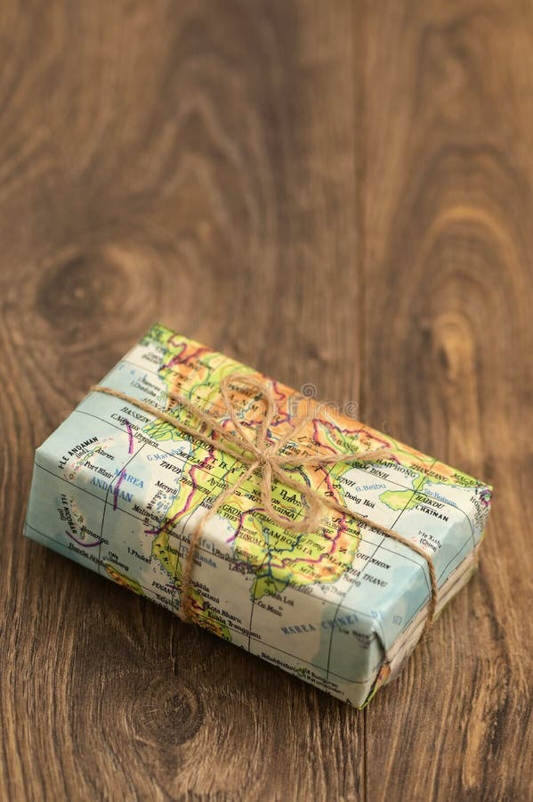 Map Travel Concept with Gift Box with String Bow Stock Photo - Image of ...