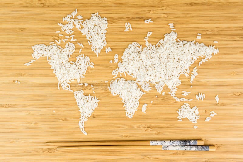 Map Of The World Made Of White Rice With Two Bamboo Sticks Stock Image ...