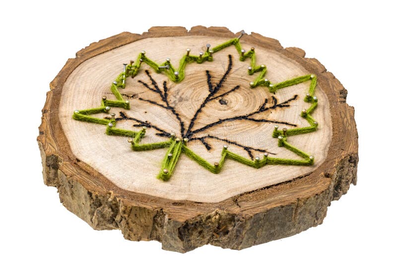 Maple Leaf Made of Wool and Nails on a Tree Slice with Pyrography ...