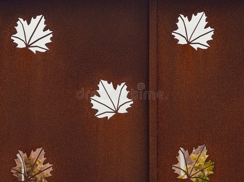 Maple Leaves Cut in Rusty Metal Stock Image - Image of maple, metal ...