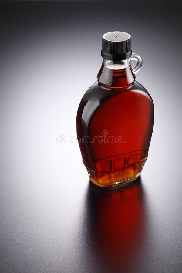 Maple syrup stock image. Image of container, traditional - 84496635