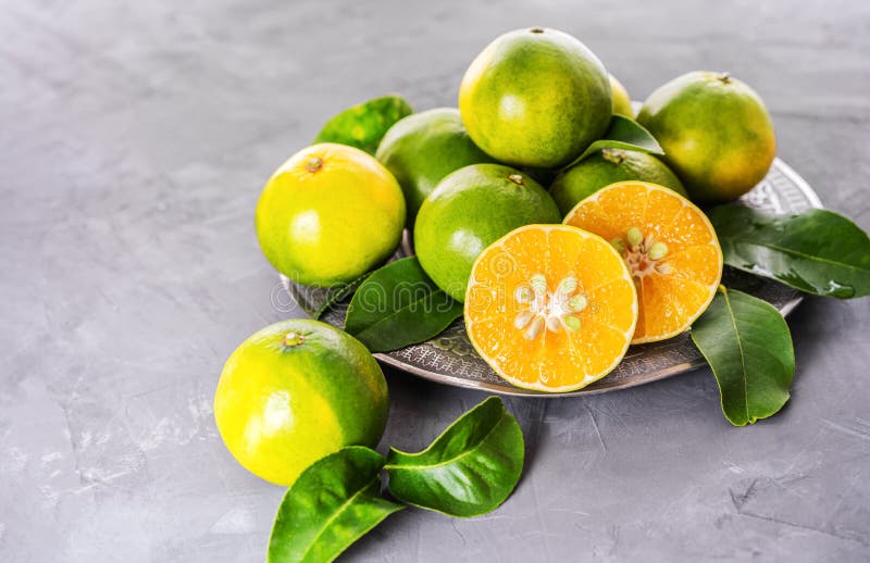 Mapo Fruits in Basket on the White Wooden Table Stock Image - Image of ...