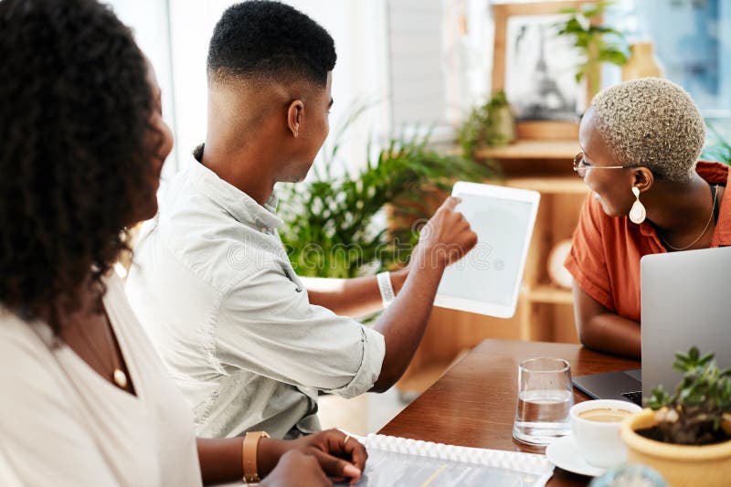 Mapping Out a New Plan Online. a Group of Businesspeople Working ...