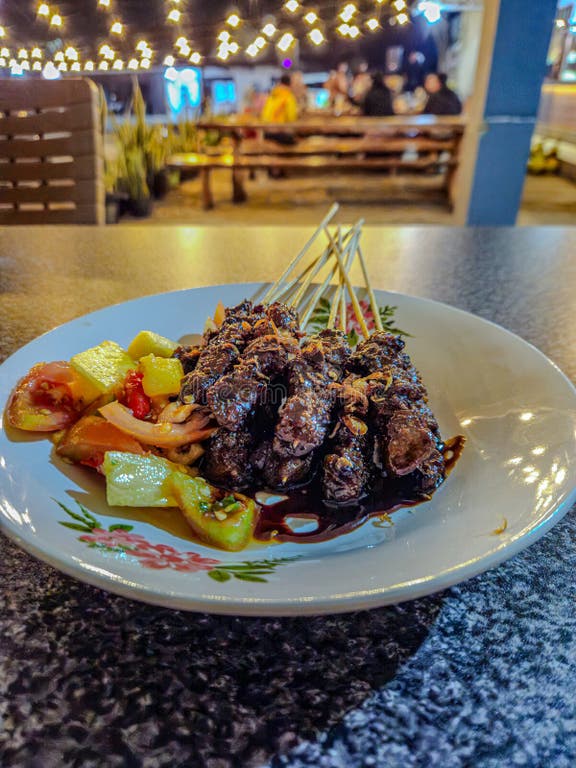 A Plate of Maranggi Satay is Served on the Table in an Attractive ...